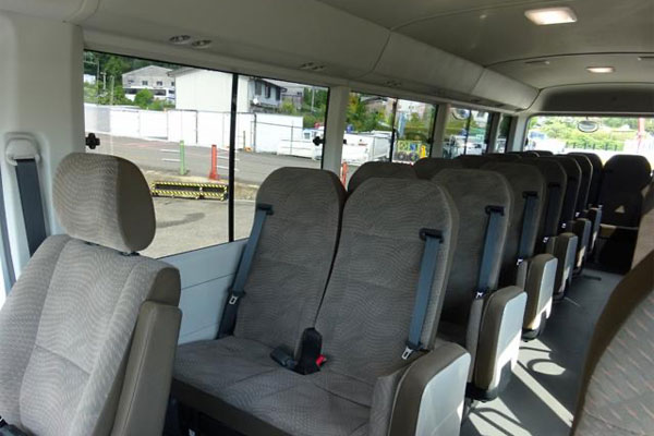 14 Seater Toyota Coaster Minibus Hire - Luxury Van Rental Delhi