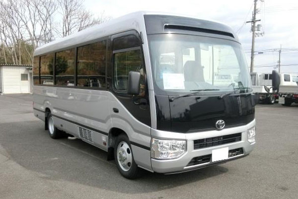 14 Seater Toyota Coaster Minibus Hire - Luxury Van Rental Delhi
