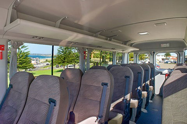 14 Seater Toyota Coaster Minibus Hire - Luxury Van Rental Delhi